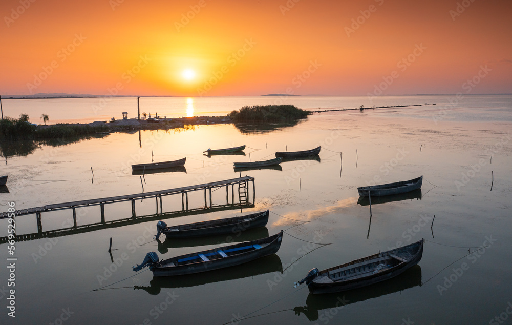 Aerial view of a beautiful sunrise in the harbour of Sarichioi village ...