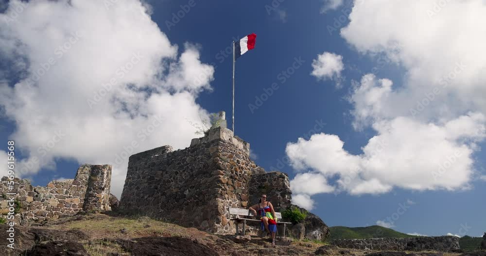 Vidéo Stock St Martin Marigot beautiful woman sitting Fort Louis ...