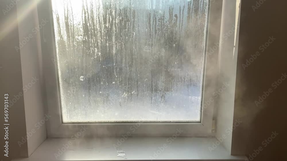 Cold winter weather. Airing housing in cold winter. Frosty air rushes ...