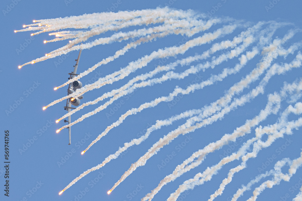 Very unusual view of a A-10 Thunderbolt II flying behind its flares ...