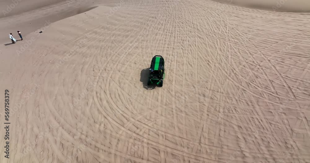 Dune buggies in Huacachina, Peru desert. Fast sand buggy driving on the ...