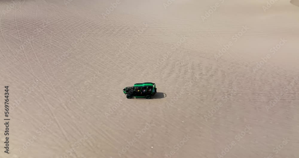 Dune buggies in Huacachina, Peru desert. Fast sand buggy driving on the ...