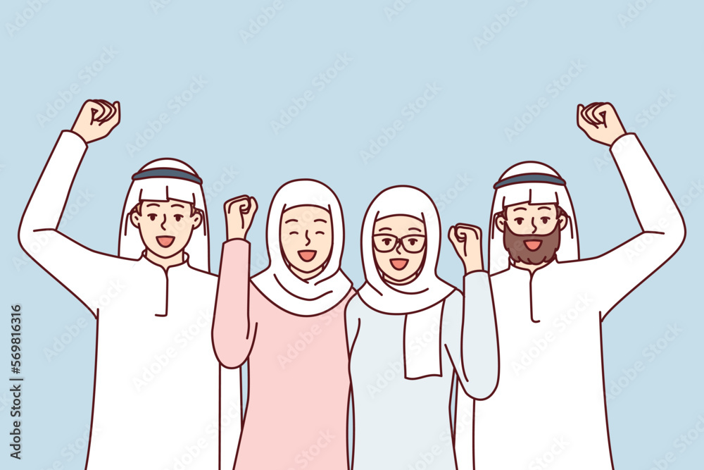 Team of people in arabic clothes make victory gestures rejoice at ...