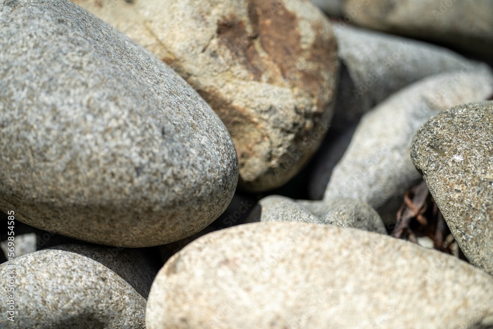 round rocks and pebbles on the beach in australia Stock Photo | Adobe Stock