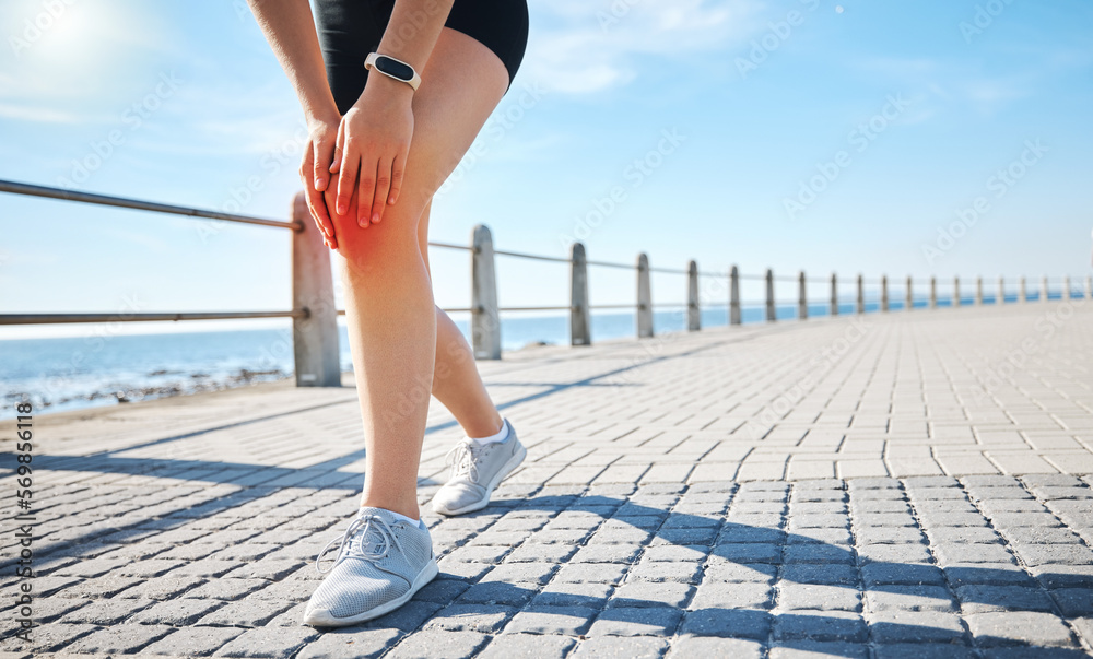 Sports athlete, knee pain or red glow by beach fitness, ocean workout ...