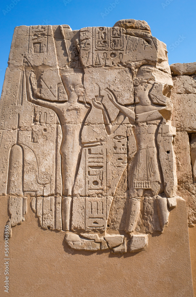 Bas-relief wall detail in Karnak temple complex, Ancient Egyptian god ...
