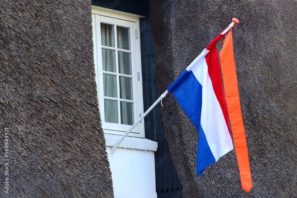 Dutch flag with orange streamer banner at Kingsday (Kings' Day ...