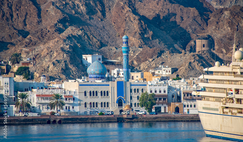 Photo Muscat, Oman a blue mosque in the bay of the old town, Nina ...