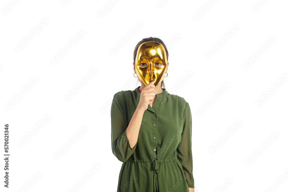 A young modern Indian Asian suspicious female hiding her face behind a ...