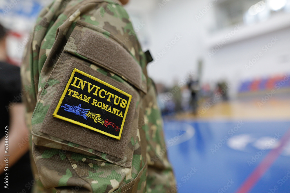 Details with an Invictus Team Romania badge on the uniform of a ...