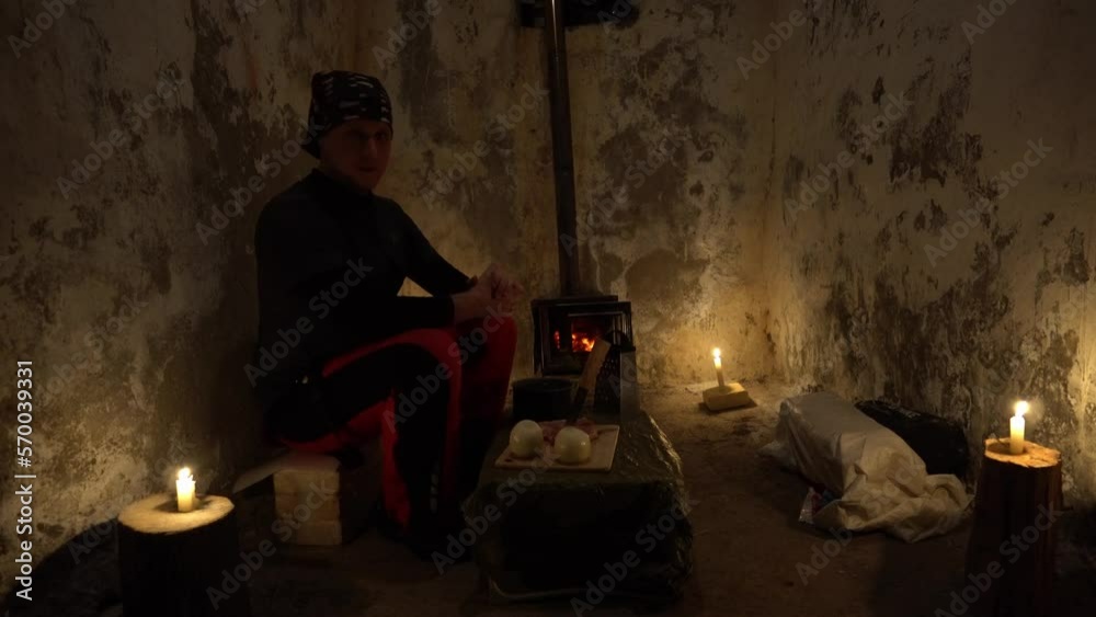 The guy in the abandoned hut is going to cook. There are products on ...