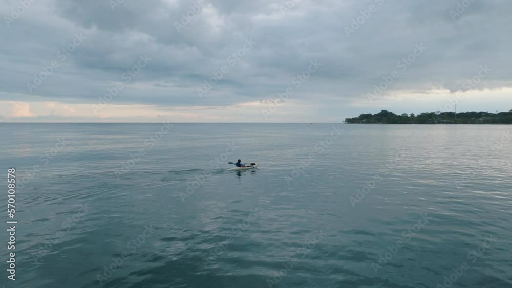 Puerto Viejo, Costa Rica - August 2022: Man paddling a one person kayak ...