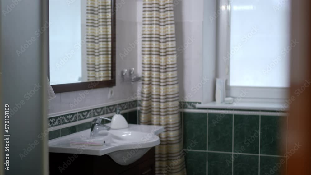 Joyful boy and girl leaving bathroom getting ready for school in the ...