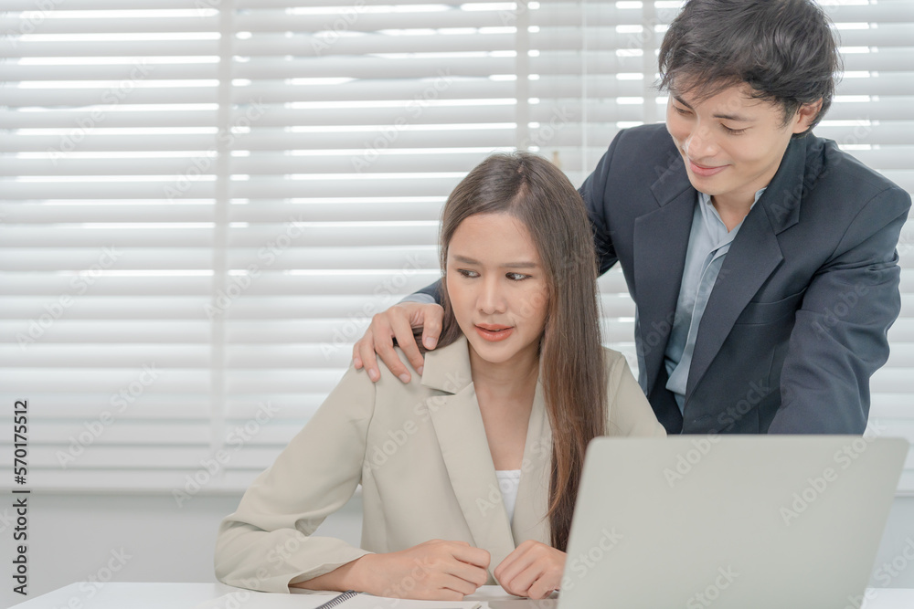 businessman sexually harassed a female colleague by touch her shoulder ...