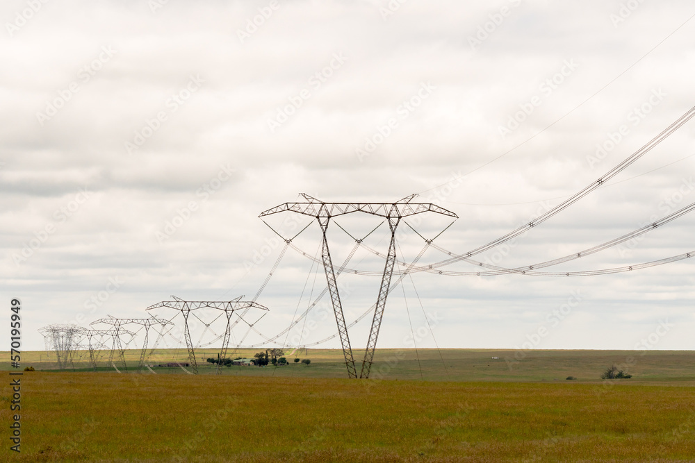 power lines in the field running through agricultural farm land in ...