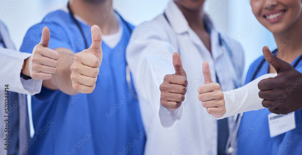 Healthcare, teamwork and group of doctors with thumbs up, hands together, collaboration and ...