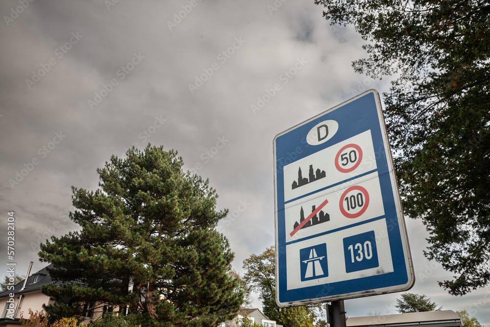 Roadsign indicating the national speed limits in Germany, on motorways ...