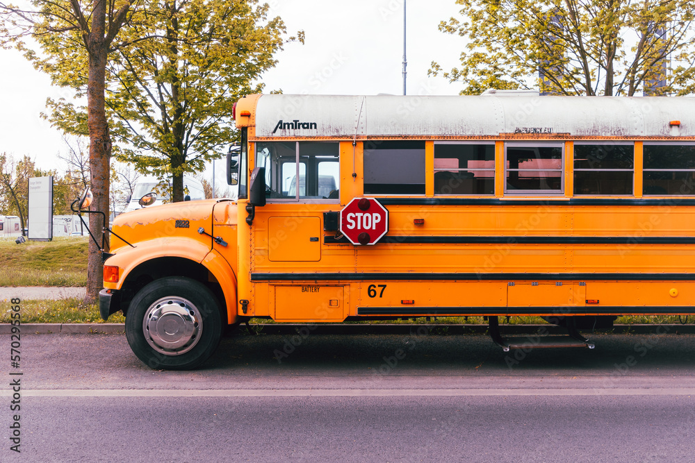Old American school bus on a street Stock Photo | Adobe Stock