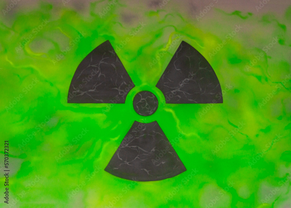 A sign of radioactive danger. A black emblem of radioactive hazard on a ...