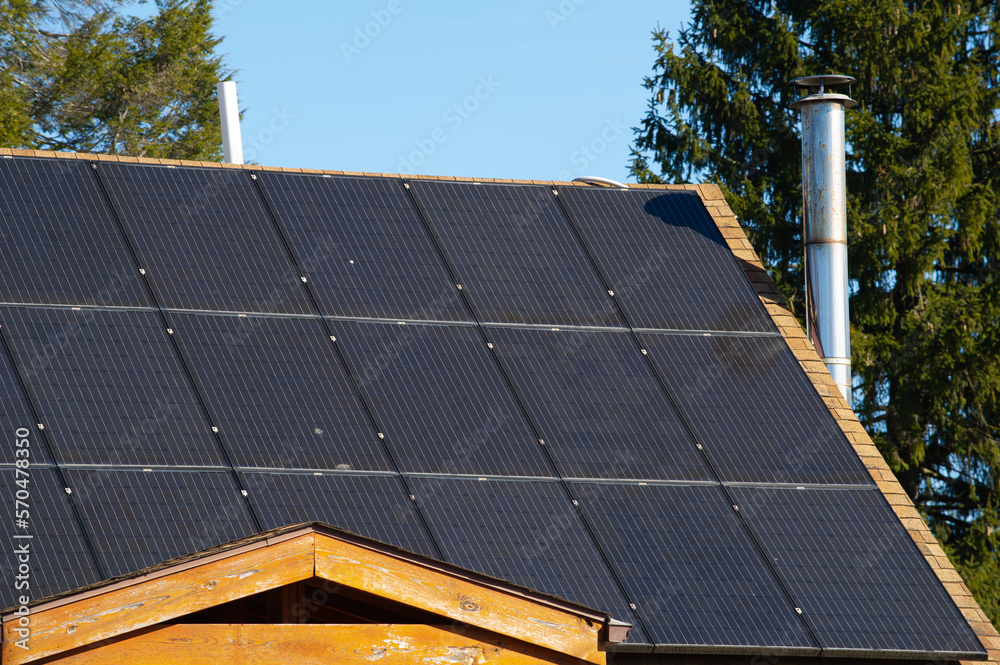 Foto de solar panels on a gable roof beautiful large modern house and ...