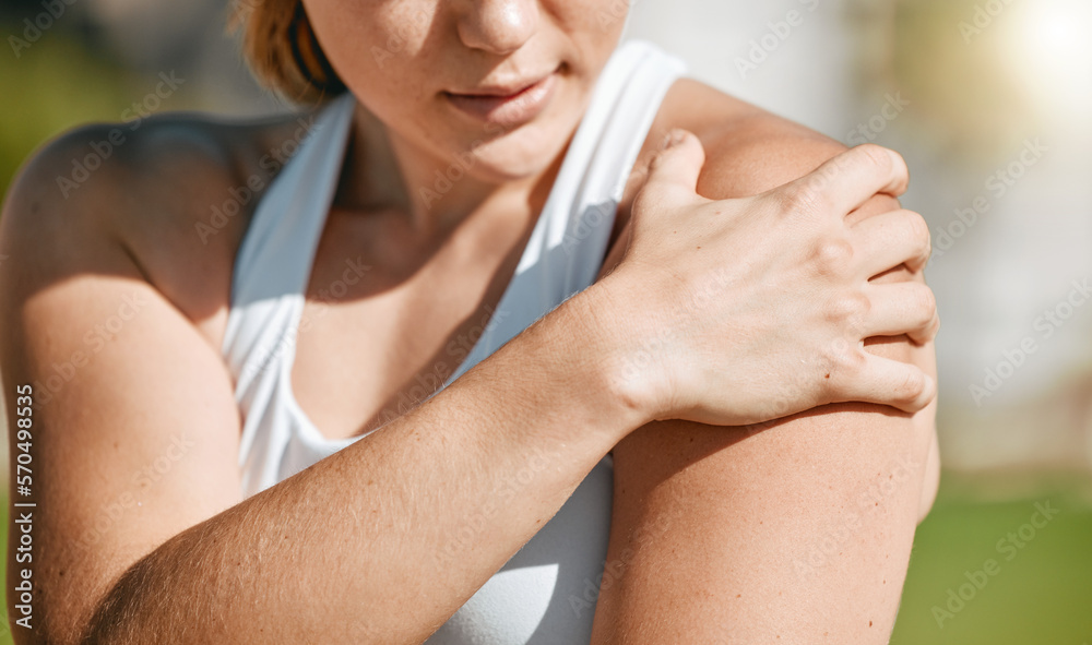 Closeup, exercise and woman with shoulder pain, outdoor and ...