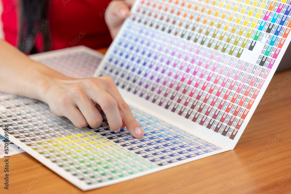 Close up, Woman's hands chosen color shades samples. Female interior ...