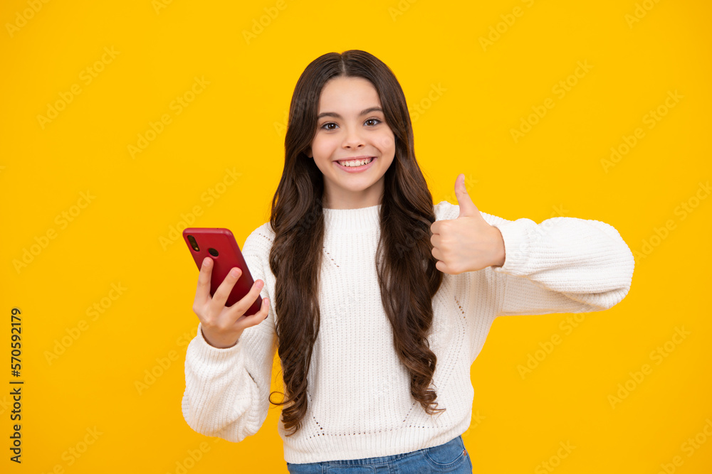 Teenage girl with smart phone. Portrait of teen child using mobile ...