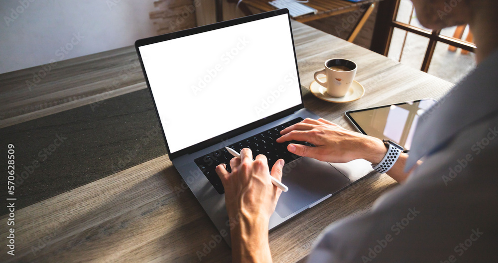 Businessman typing on his computer white screen mockup. Replace laptop ...