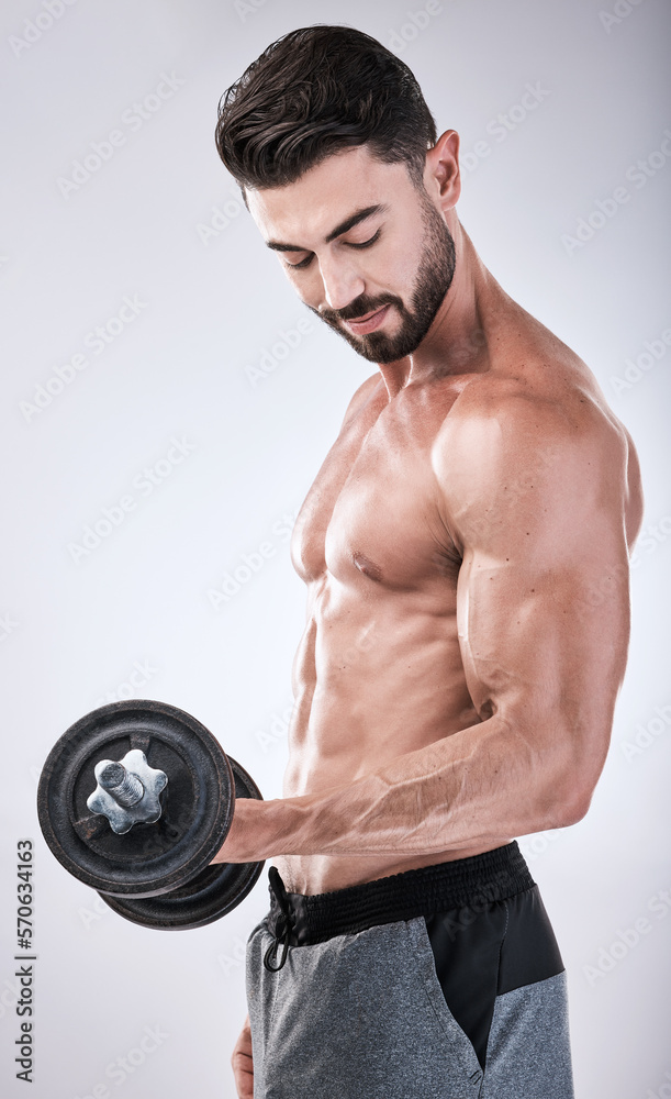 Fitness, power or strong man with a dumbbell in training, exercise or ...