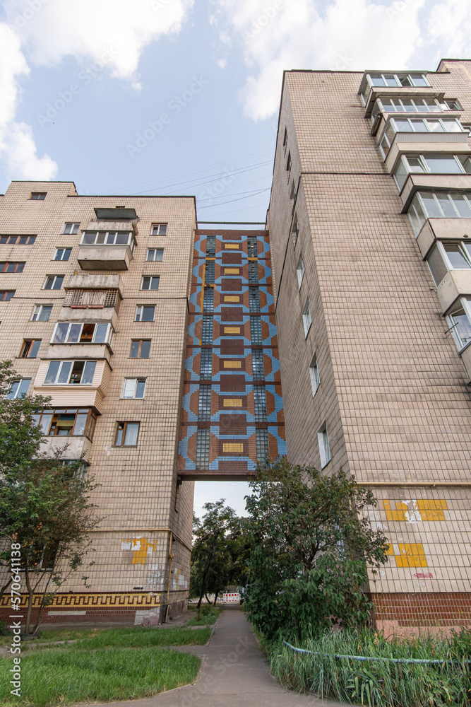 Facade wall of a panel apartment building of a Soviet house lined with ...