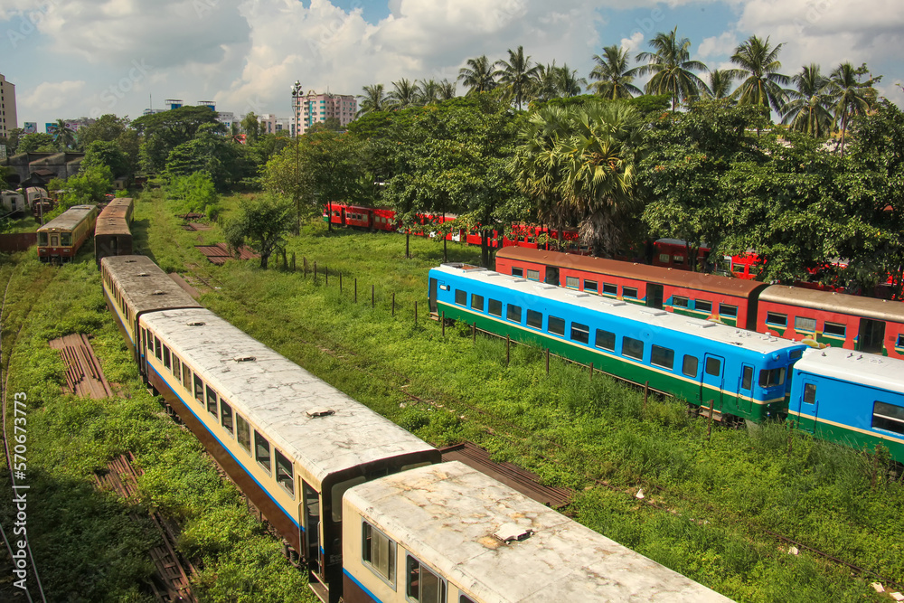 Trains parked behind Yangon Central railway station located in downtown Yangon which dats from ...
