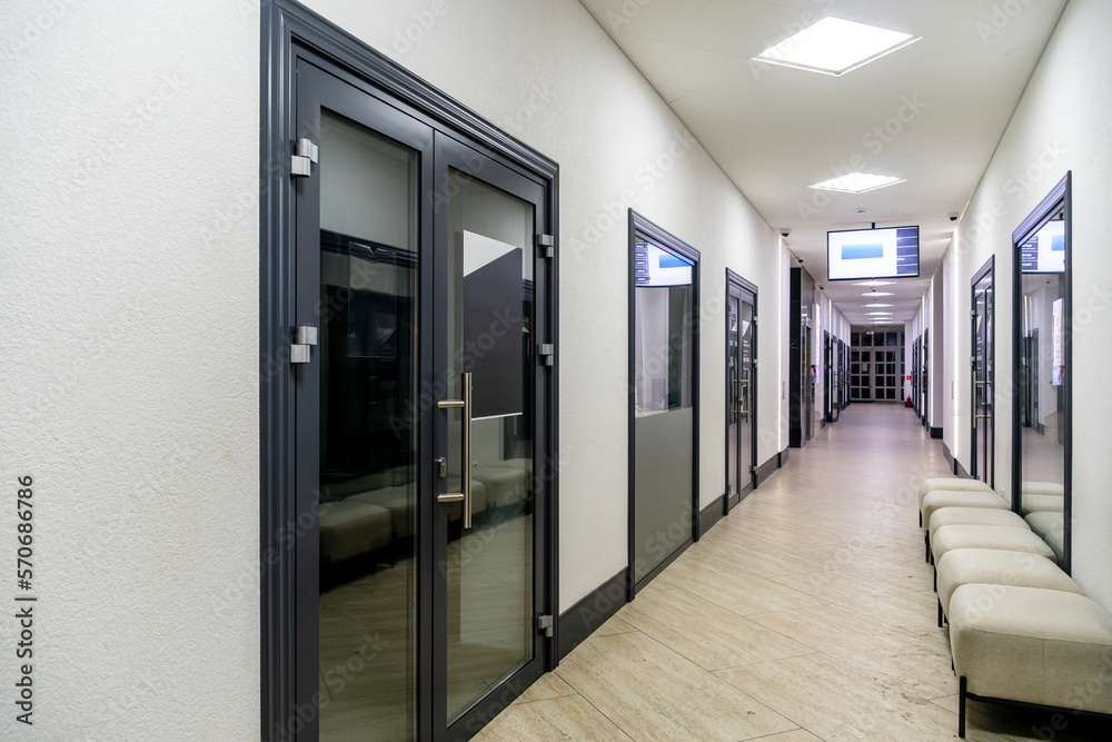 A corridor in an urban-type office building. Modern interior of the ...