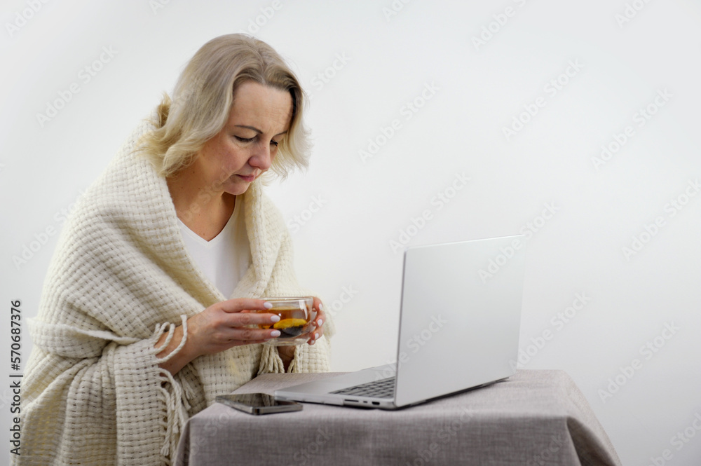 adult woman looking computer monitor looking for medicines ...
