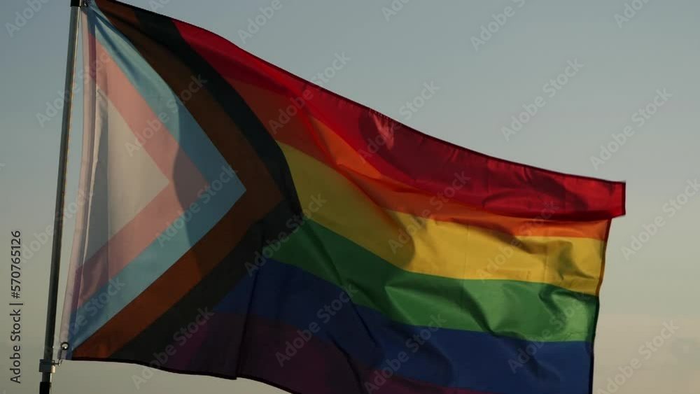 Proudly Flying the LGBT Flag The rainbow pride flag represents the ...