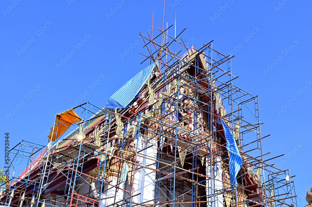 Part of the The temple roof is under construction of a temple in ...