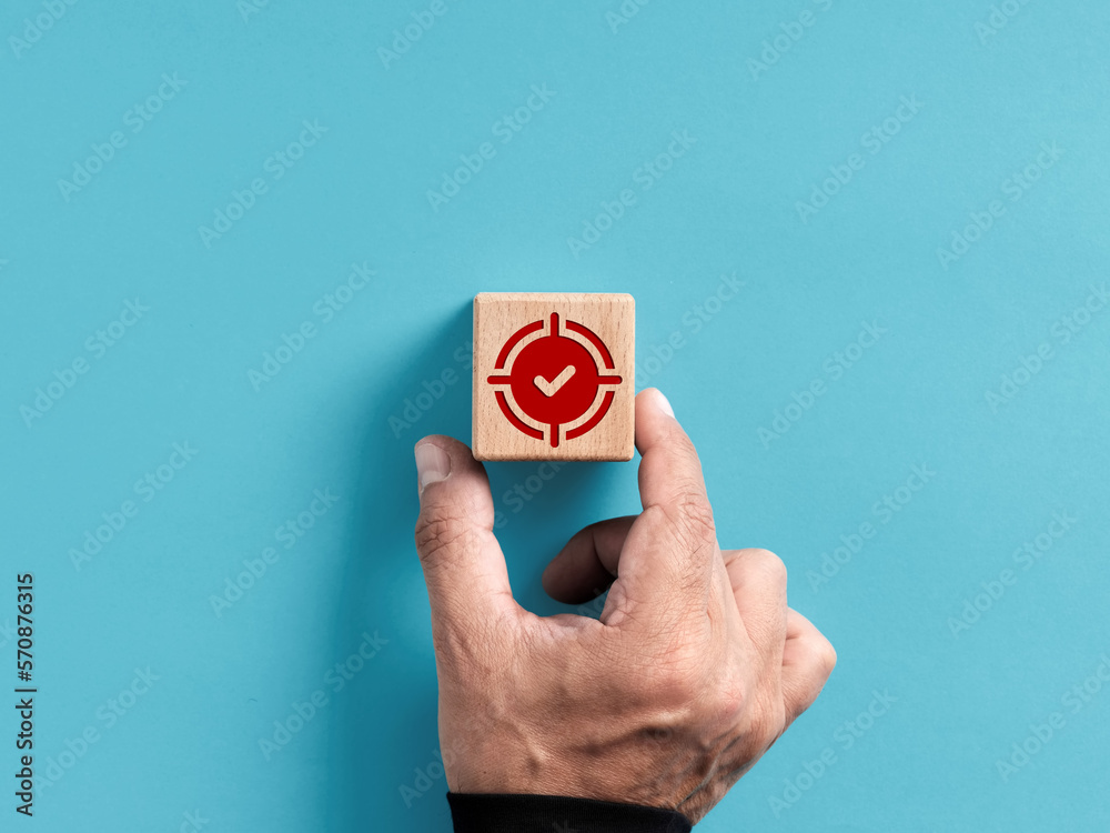 Business target goal achievement. Task completion. Hand places the ...