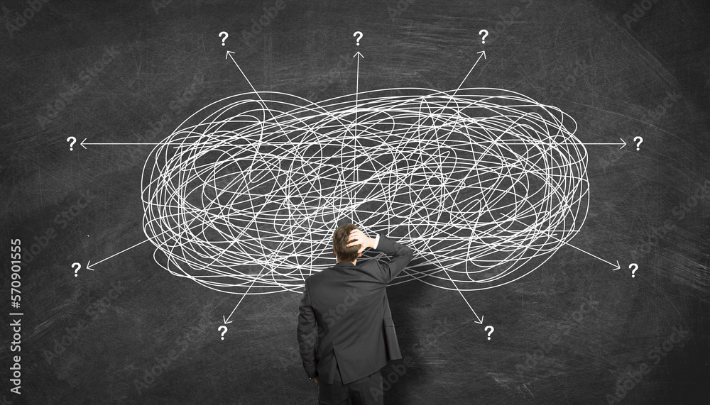 Businessman Looking At perplexed ways Searching For Solution. Business ...