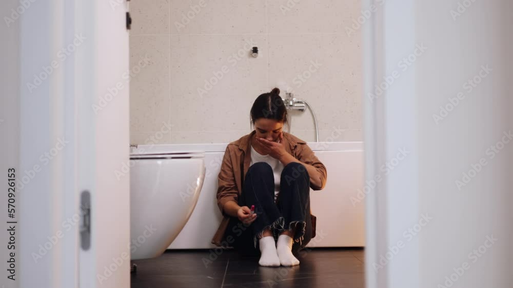 Anxious young white woman with nervous feelings on bathroom. Caucasian ...