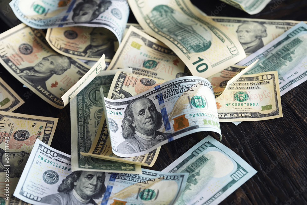 Money, US dollar bills background. Money scattered on the desk ...