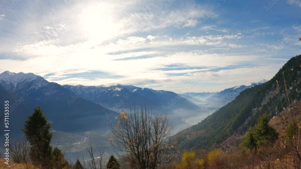 4K shot of Kullu valley during the foggy morning as seen from the top ...