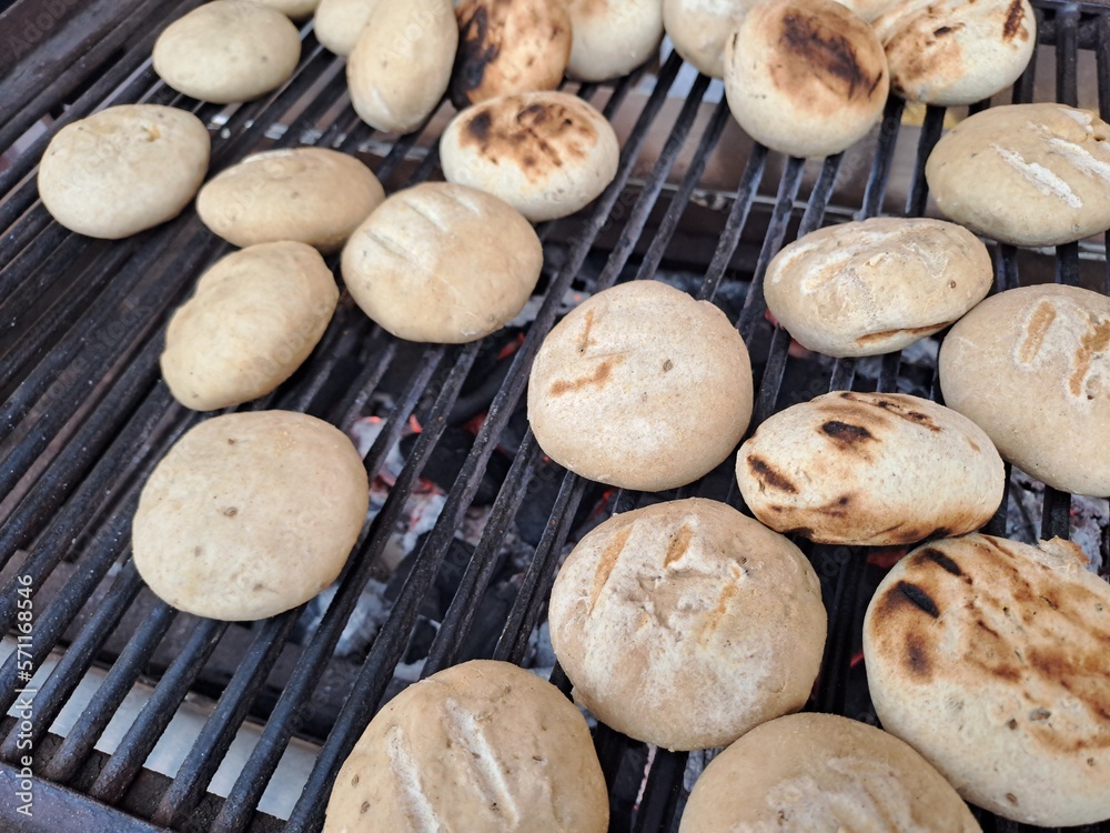 Litti, traditional food from Bihar, India getting baked Stock Photo ...