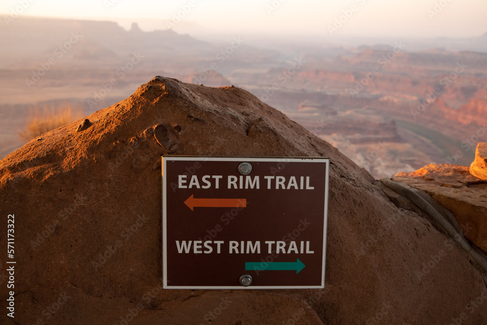 East and West rim Trail Sign in Dead Horse State Park at sunrise Stock ...