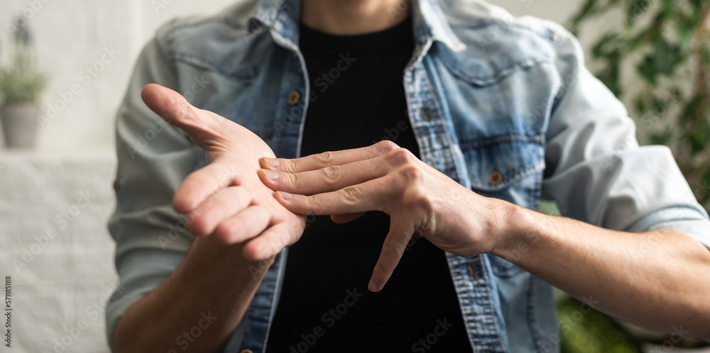 Sign language interpreter man translating a meeting to ASL, American ...