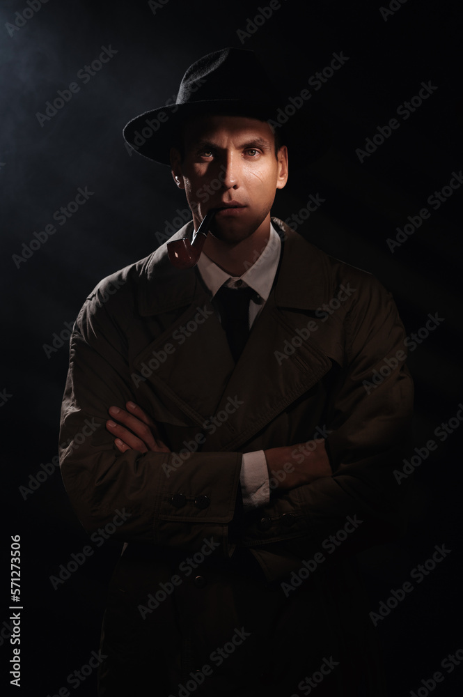 A dark portrait of a male detective in a coat and hat. Dramatic noir ...