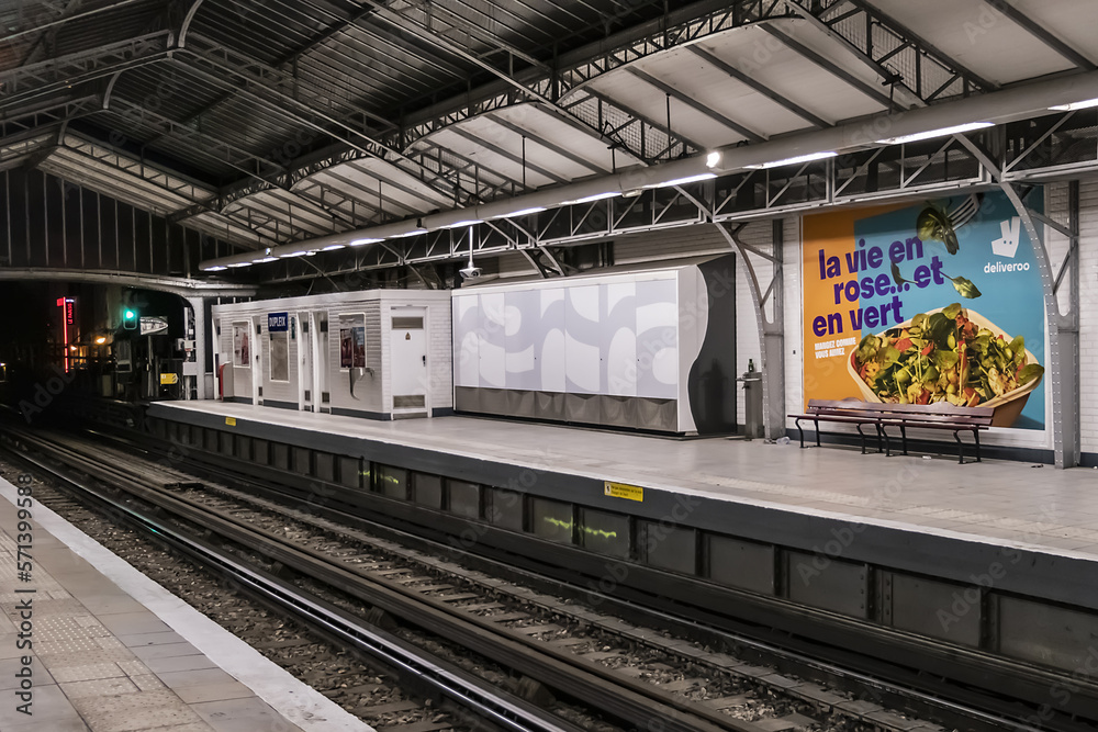 Interior of Dupleix station on line 6 of the Paris Metro. The track and ...