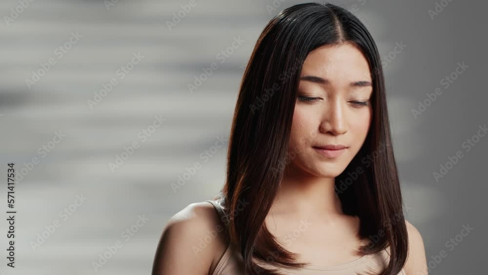 Female model embracing imperfections for self love ad, asian girl ...