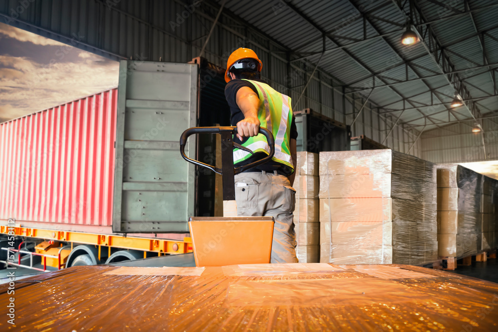 Workers Unloading Package Boxes on Pallets in Warehouse. Delivery Truck ... Workers Unloading Package Boxes on Pallets in Warehouse. Delivery Truck ...