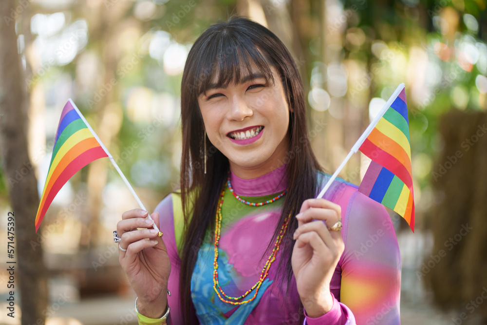 Happy Thai transgender Asian woman LGBTQIA with rainbow flag during ...