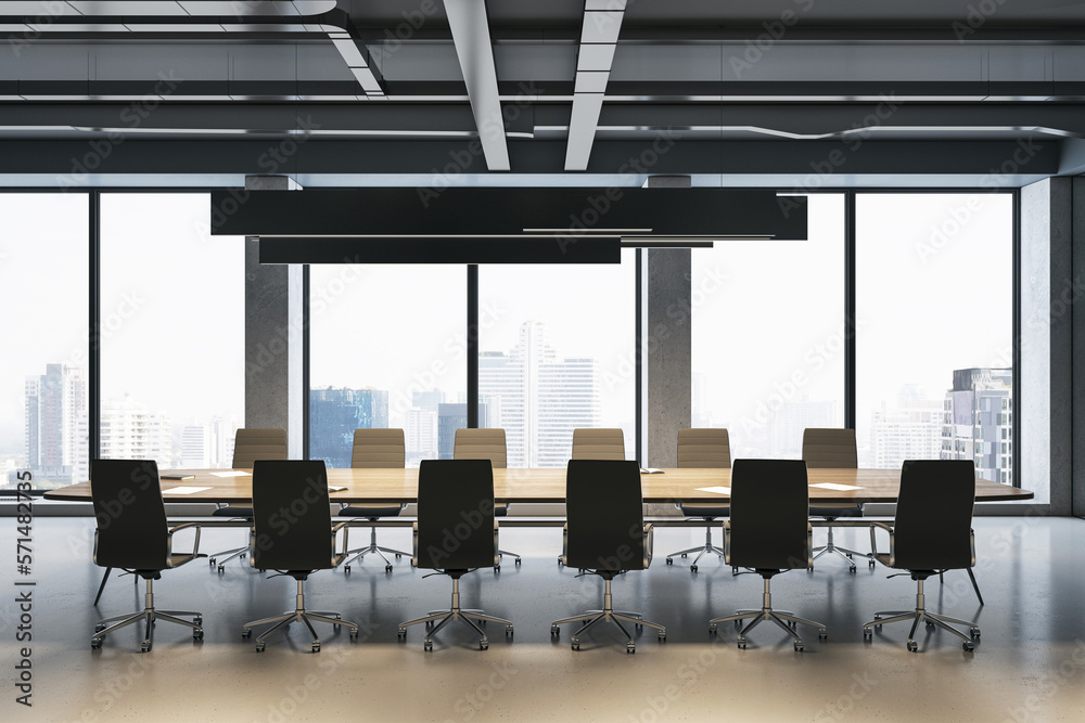 Front view on big light meeting table with rows of chairs around on ...