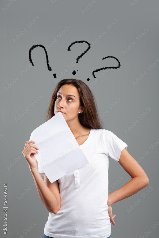 Thin young woman with questioning letter and three question mark Stock ...